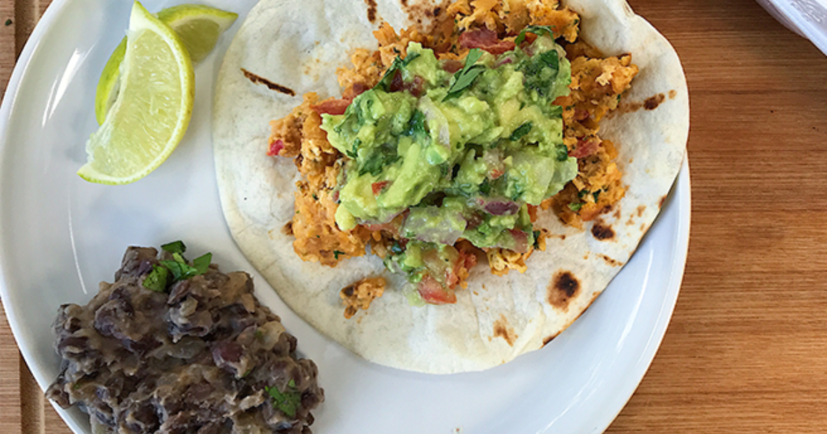 Migas with Refried Black Beans and Guac Recipe | Eggland's Best